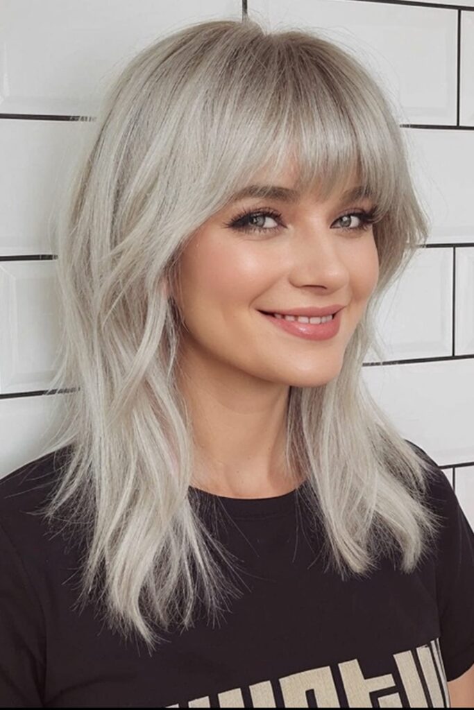 Chop It Like It's Hot: 20 Wolf Cut with Bangs Ideas to Refresh Your Look!